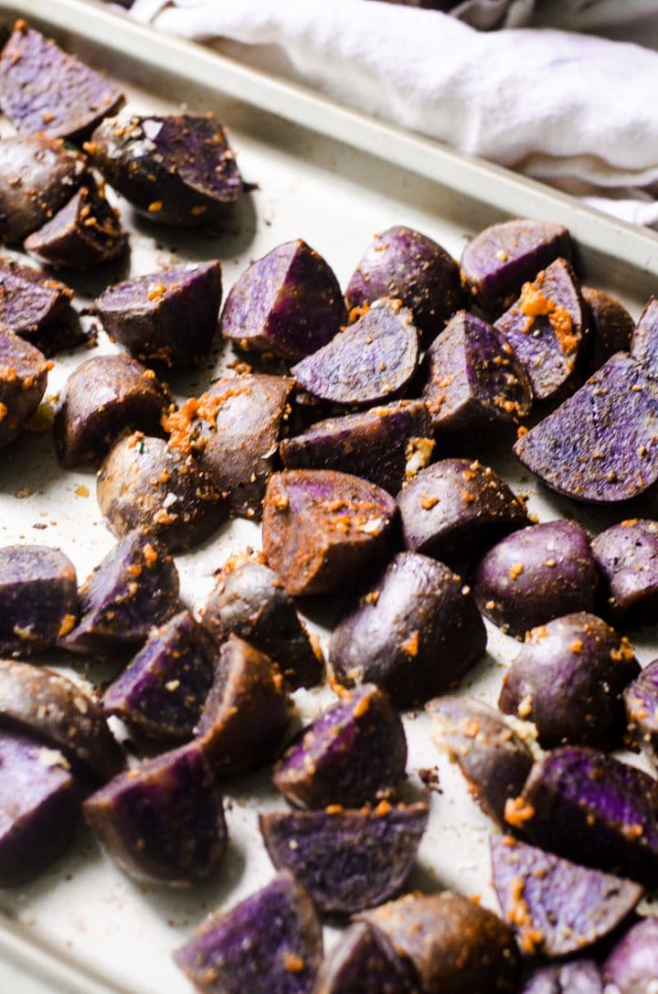 Garlicky Roasted Purple Potatoes - Food Above Gold